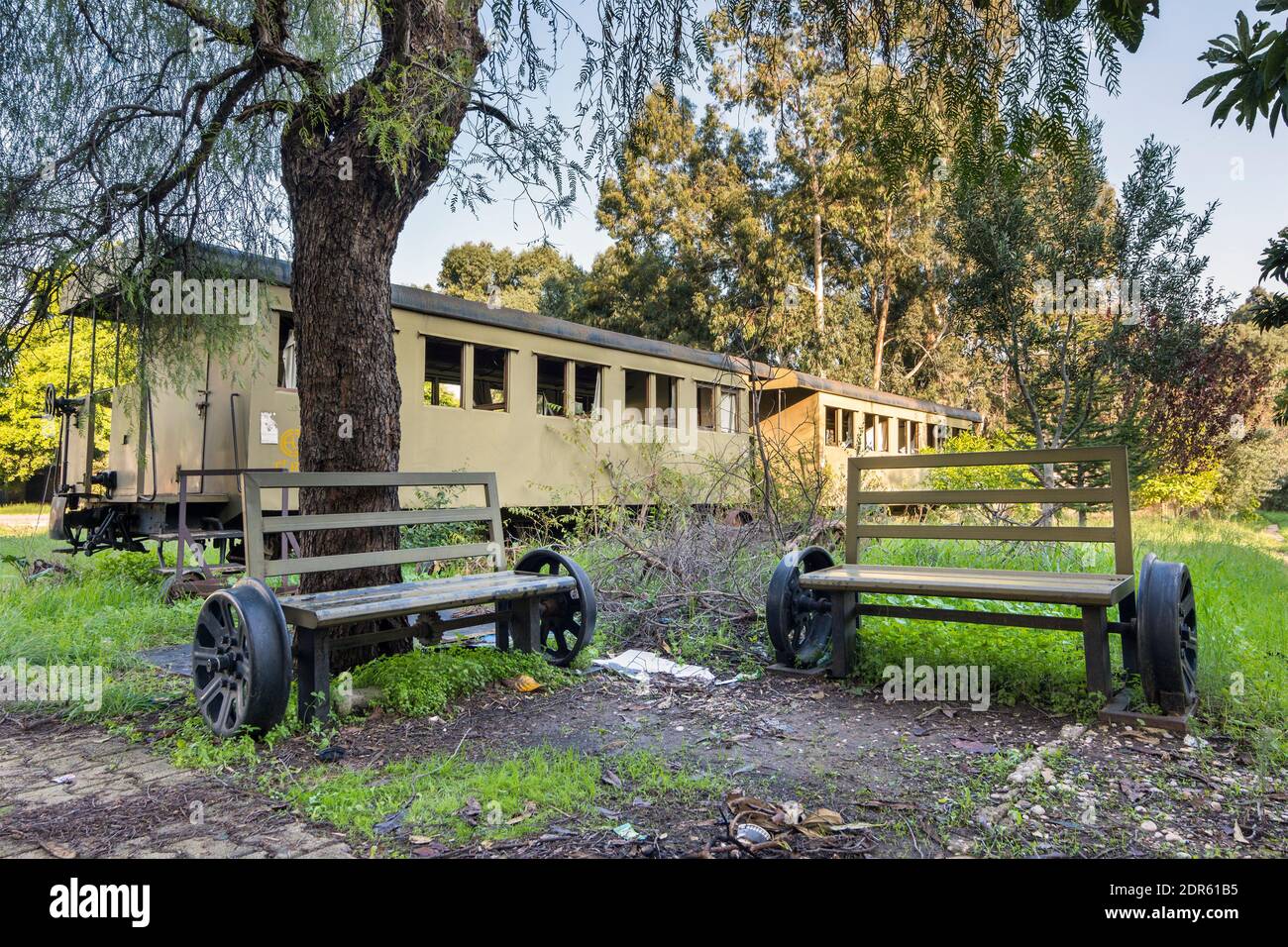 Benches with train wheels in the old abandoned Beirut train station ...