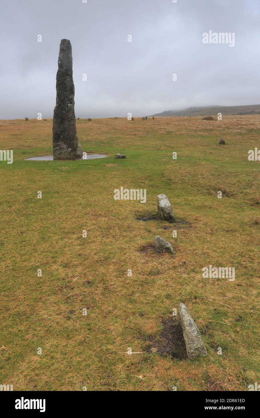 Standing Stone with a stone circle in the background at Merrivale ...