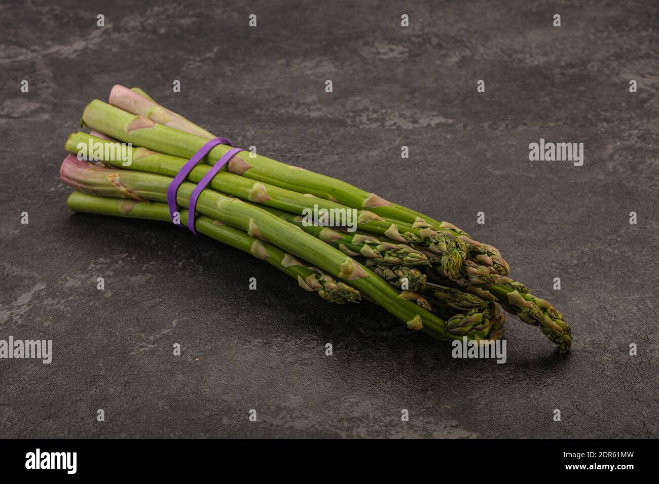 Vegan cuisine - Raw asparagus heap for cooking Stock Photo - Alamy