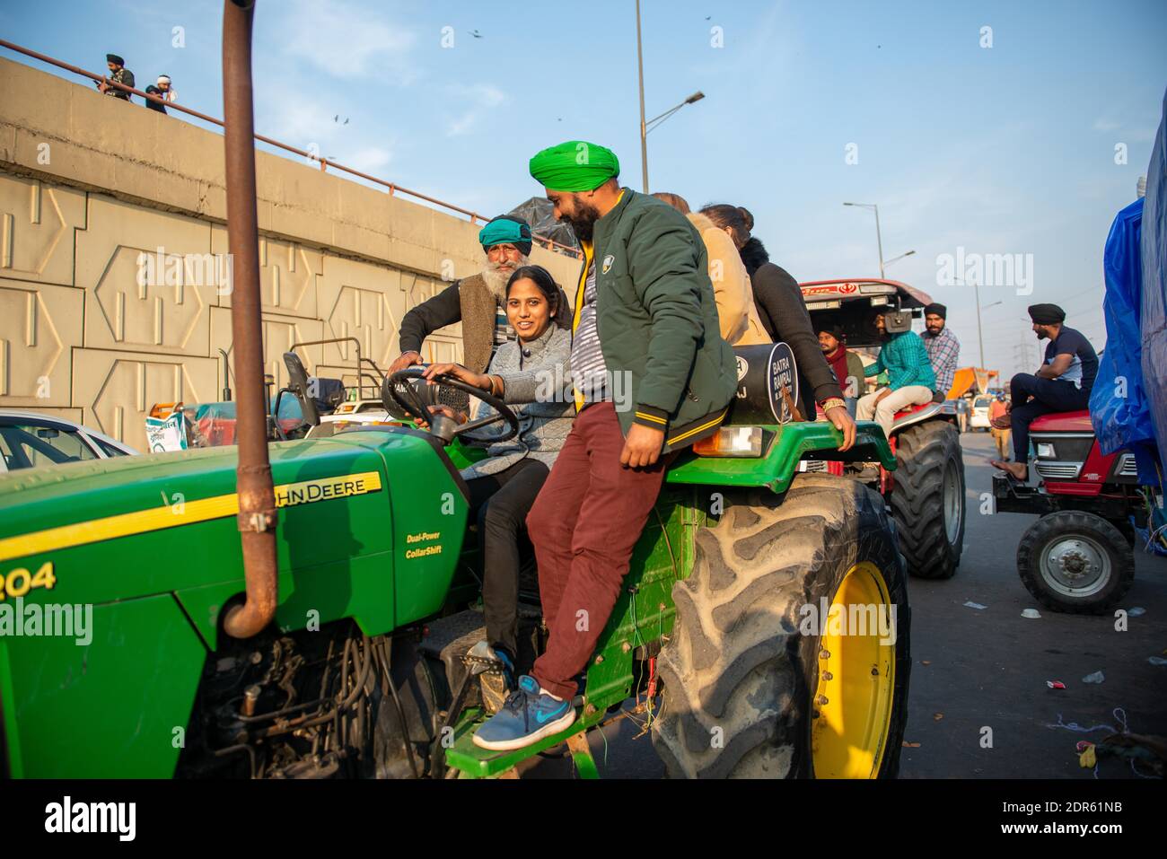 Poonam Pandit an International shooter drives a tractor during the ...