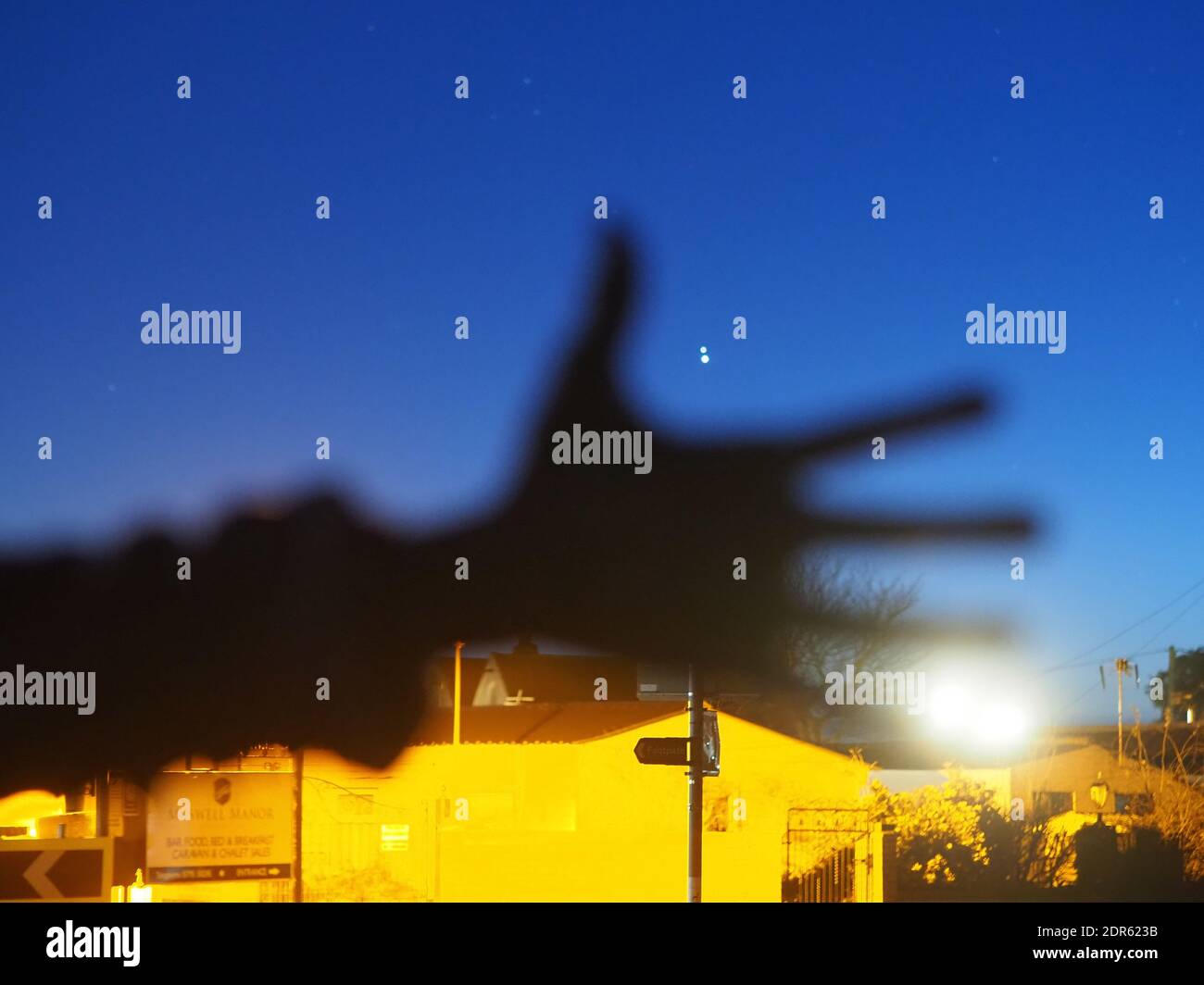 Shellness, Kent, UK. 20th December 2020. Saturn seen close to Jupiter ...