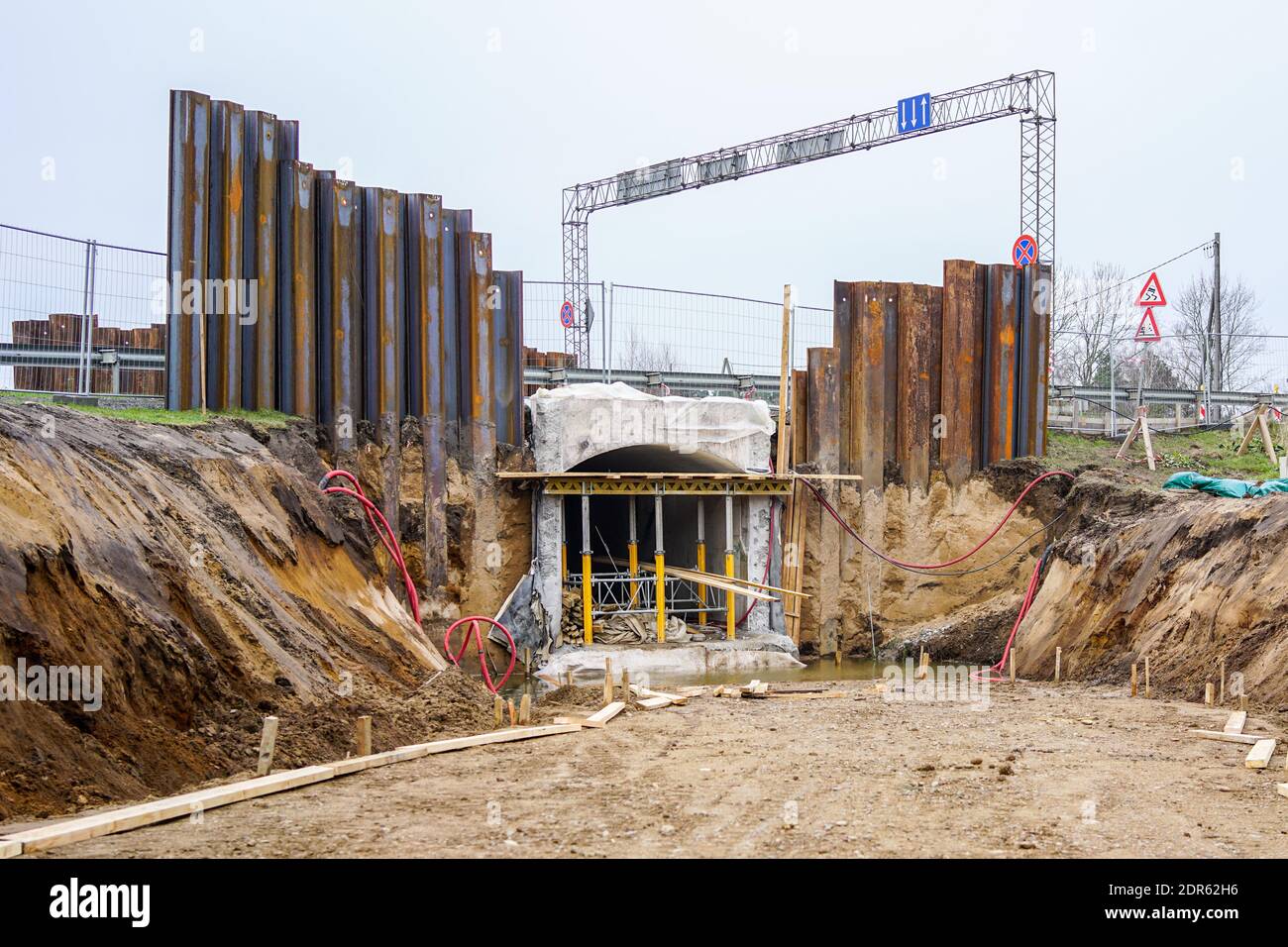 construction of a pedestrian tunnel under the highway, temporary metal ...