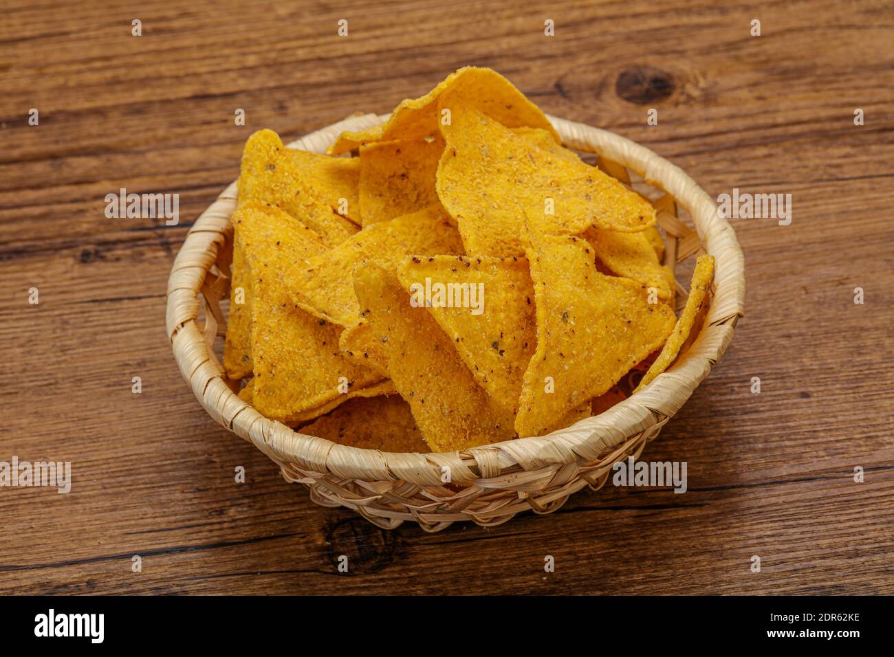 Mexican crunchy corn nachos triangle heap Stock Photo - Alamy