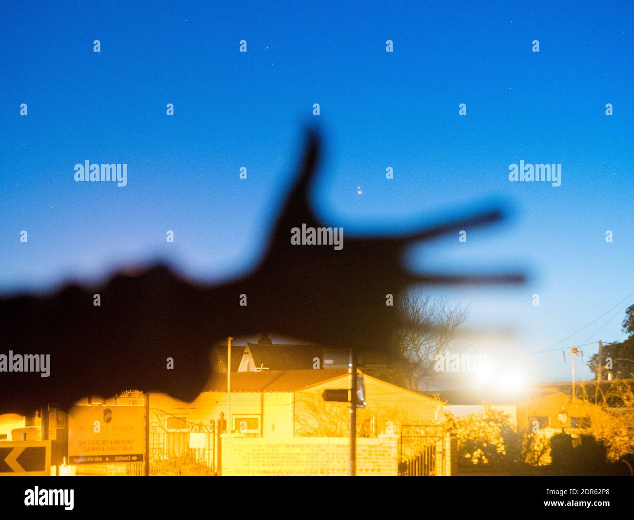 Shellness, Kent, UK. 20th December 2020. Saturn seen close to Jupiter ...