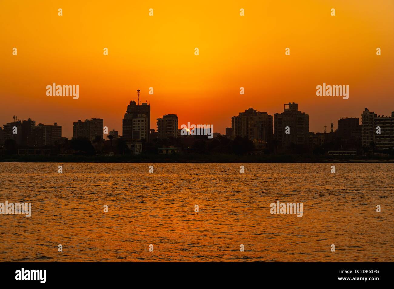 An astonishing view of the sunset on the Nile river from a boat of the ...