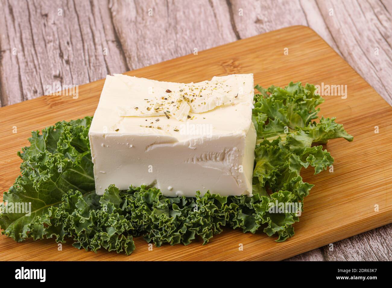 Traditional tasty Greek Feta soft cheese brick Stock Photo - Alamy