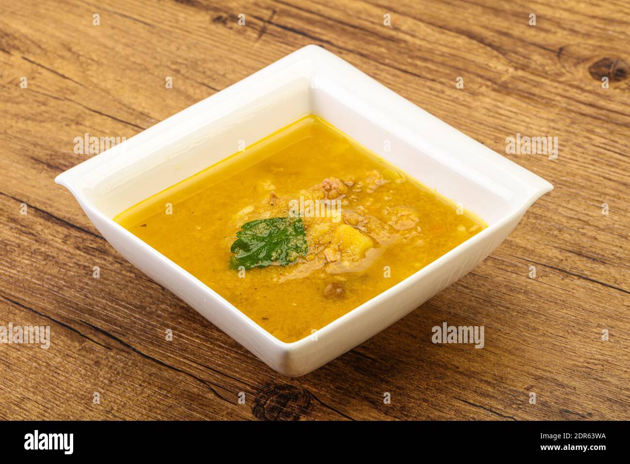 Pea soup with smoked meat and vegetables Stock Photo - Alamy