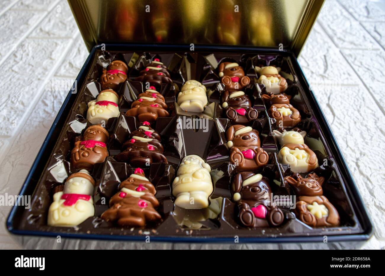 An open box of chocolates . A box of Christmas candies Stock Photo - Alamy