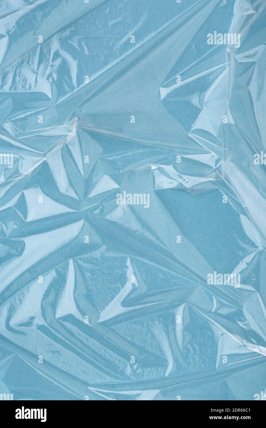 Wrinkled cling film, blue vinyl abstract background. Minimal, flat lay ...
