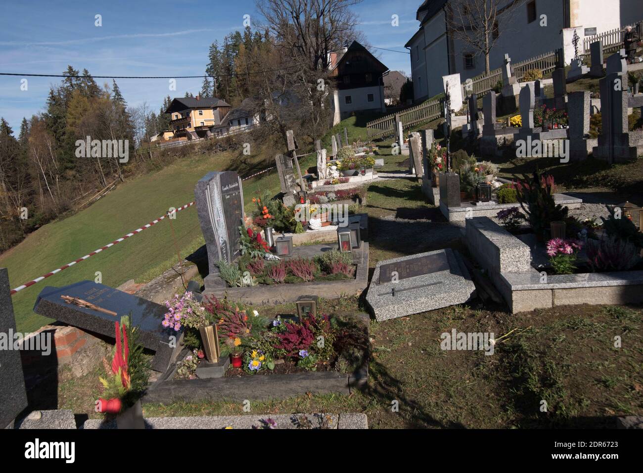 the desecrating of graves on a cemetery or a graveyard Stock Photo - Alamy