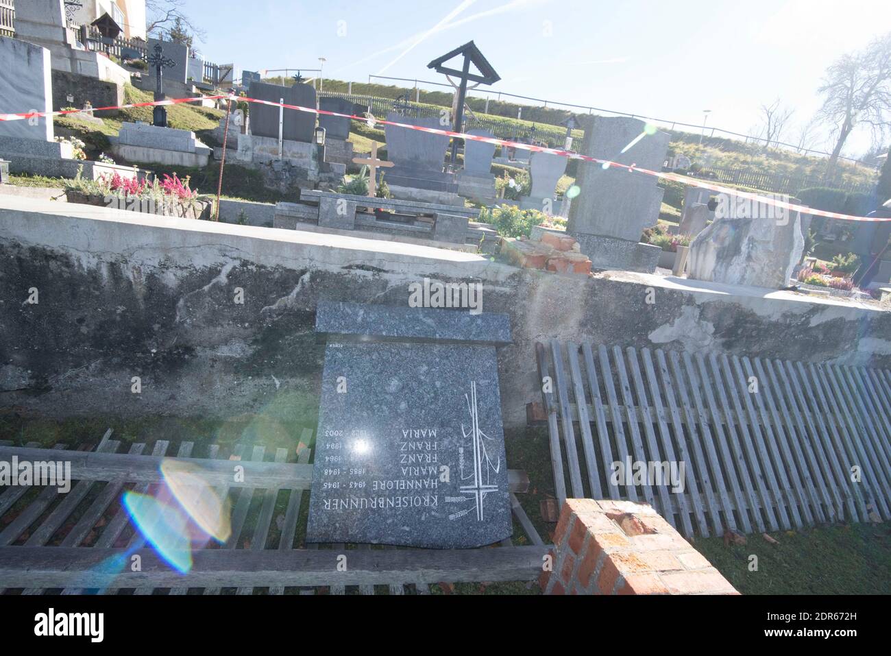 the desecrating of graves on a cemetery or a graveyard Stock Photo - Alamy