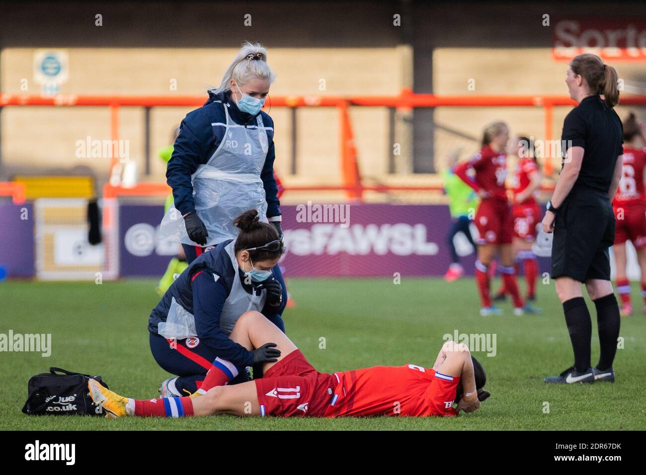 Natasha Harding #11 of Reading injured and receiving treatment on the ...
