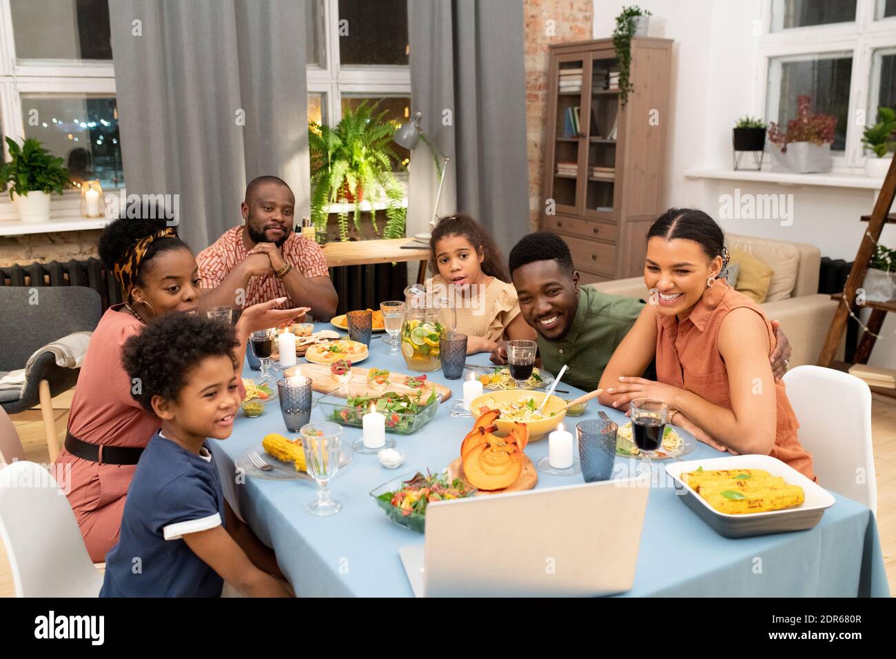 Big African family consisting of father, mother, two sons and daughters ...