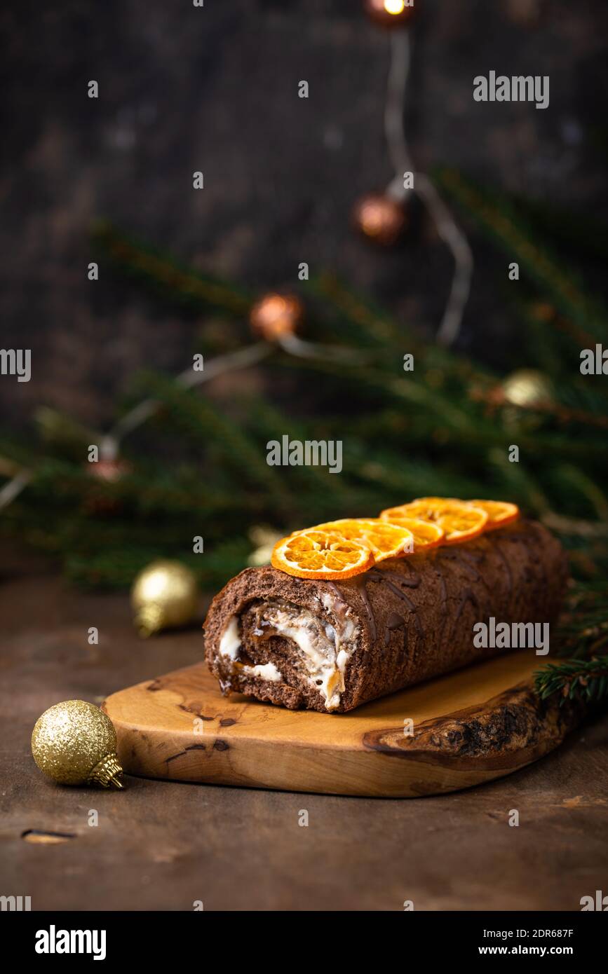 Christmas chocolate roll cake with cream Stock Photo - Alamy