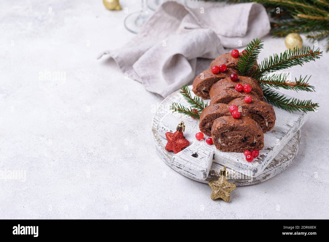 Christmas chocolate roll cake with cream Stock Photo - Alamy