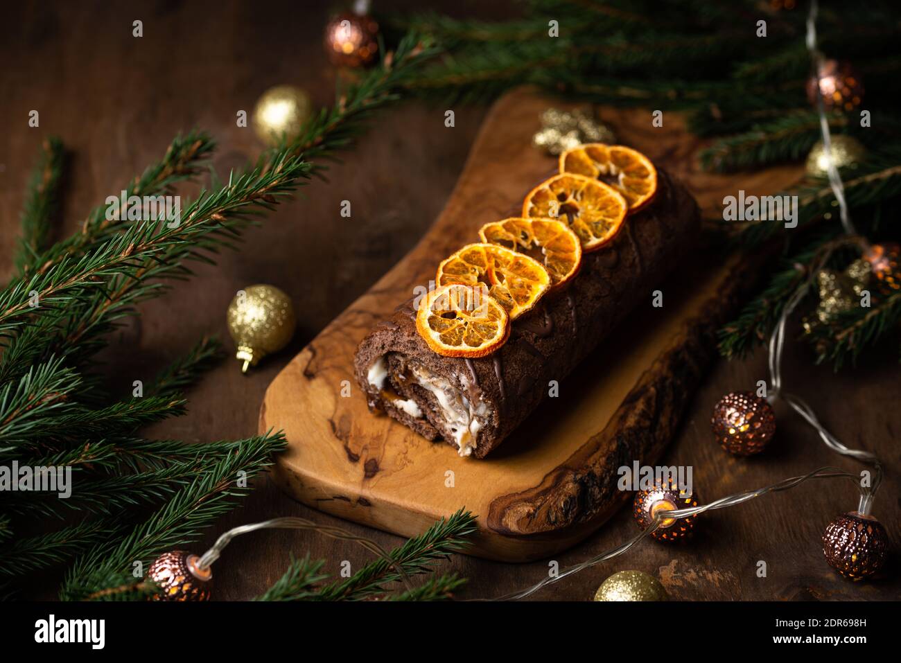 Christmas chocolate roll cake with cream Stock Photo - Alamy