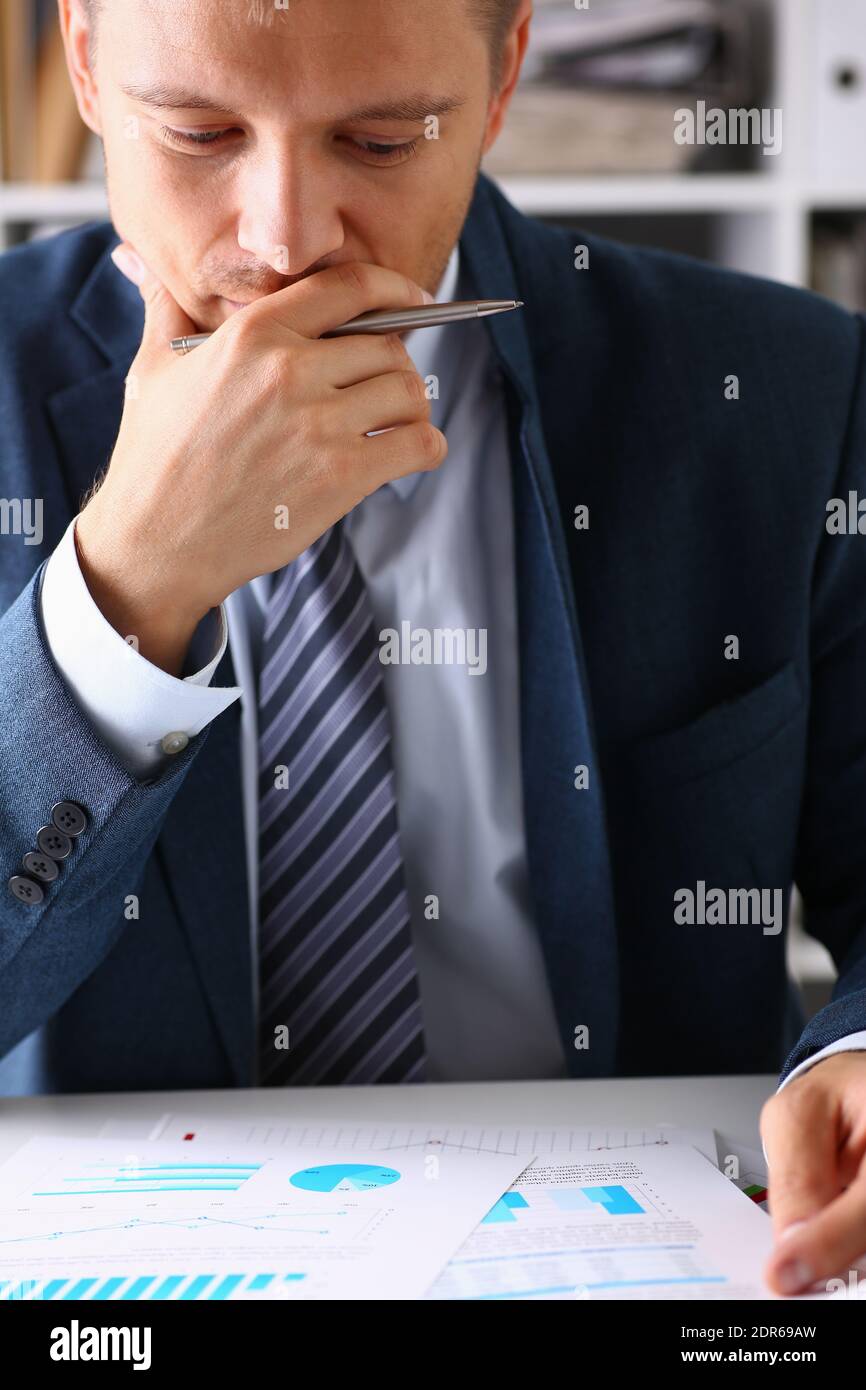 Examines documents hi-res stock photography and images - Alamy