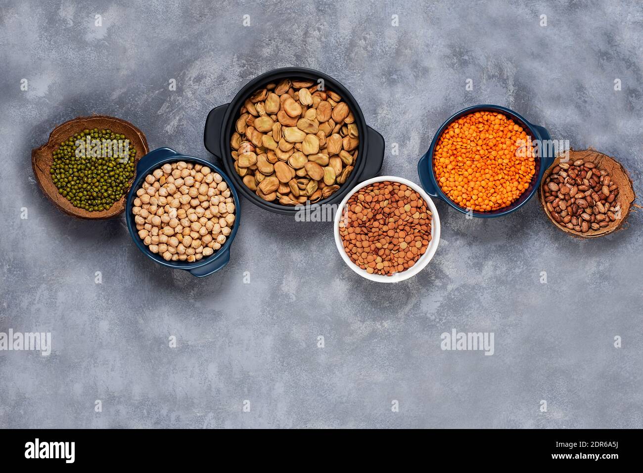 Various assortment of legumes beans, chickpeas, lentils, green peas ...