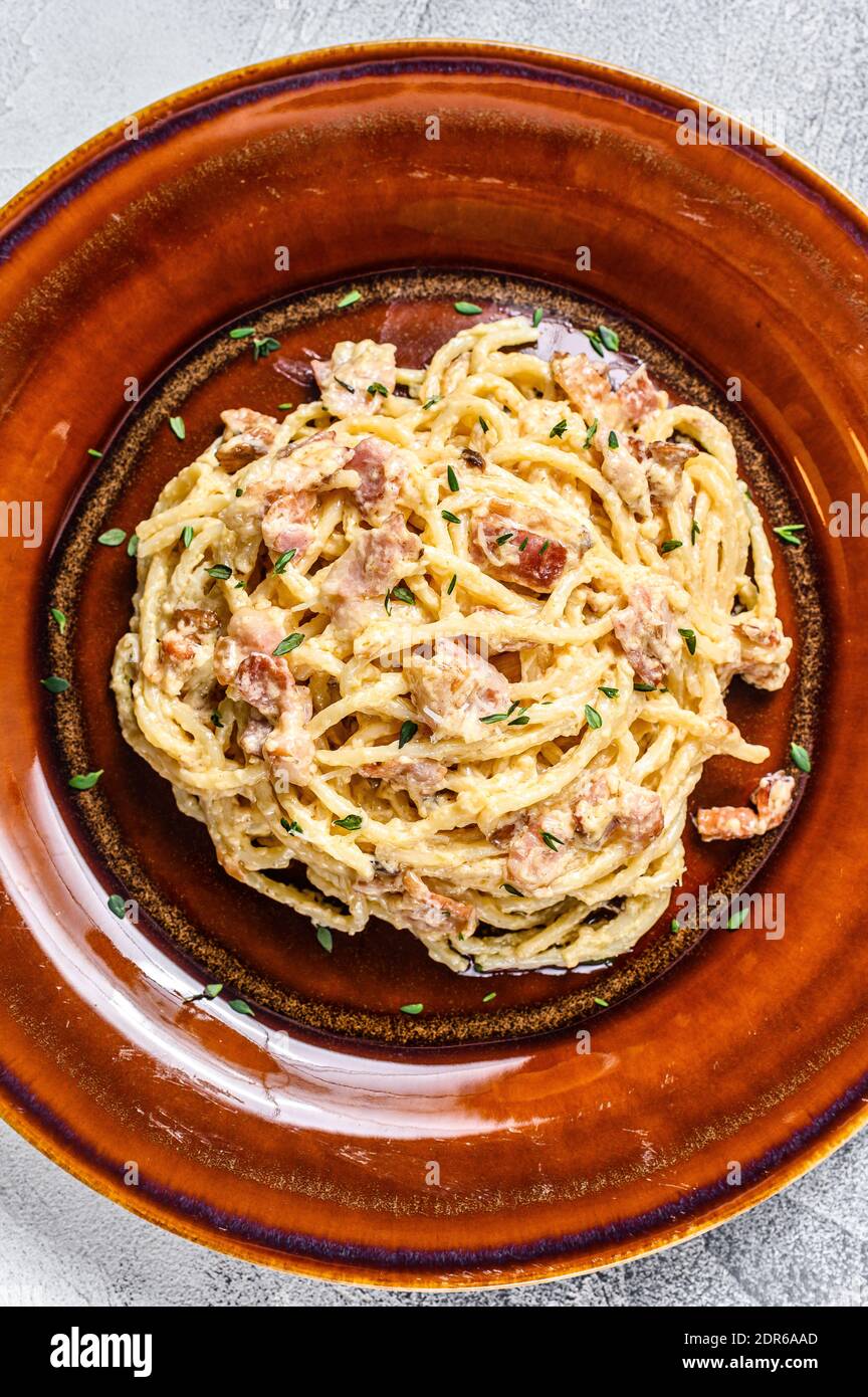 Italian Spaghetti Carbonara pasta with bacon, hard parmesan cheese and ...