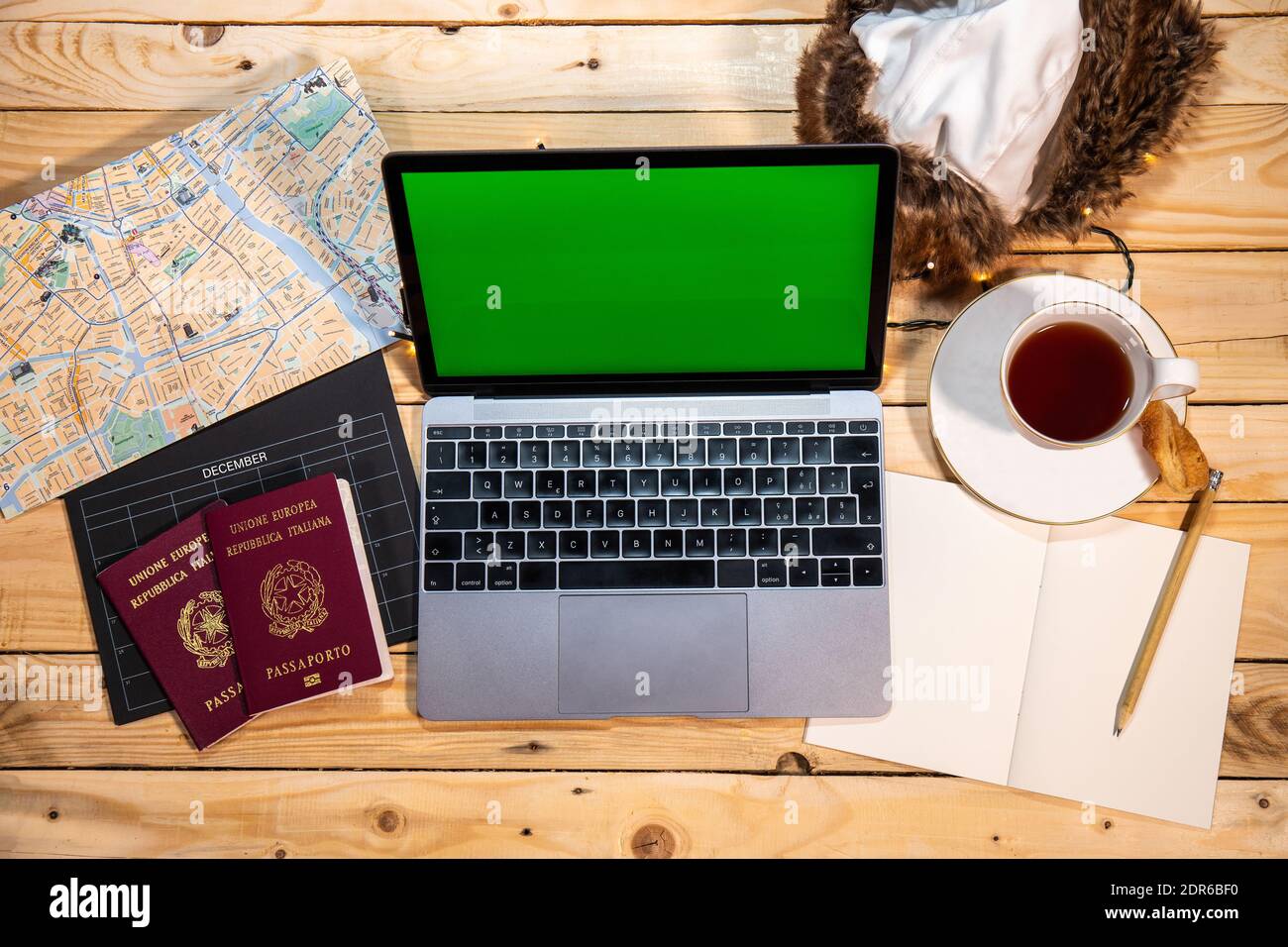 Planning a trip laptop map hi-res stock photography and images - Alamy