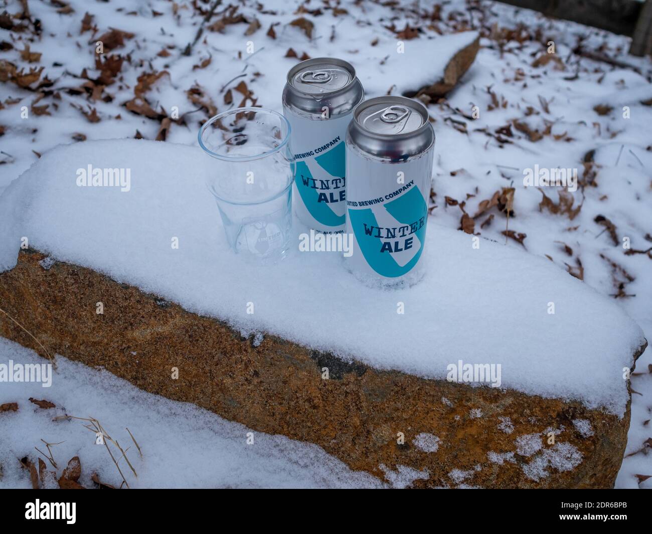 winter ale beer cans on snowy background Stock Photo - Alamy