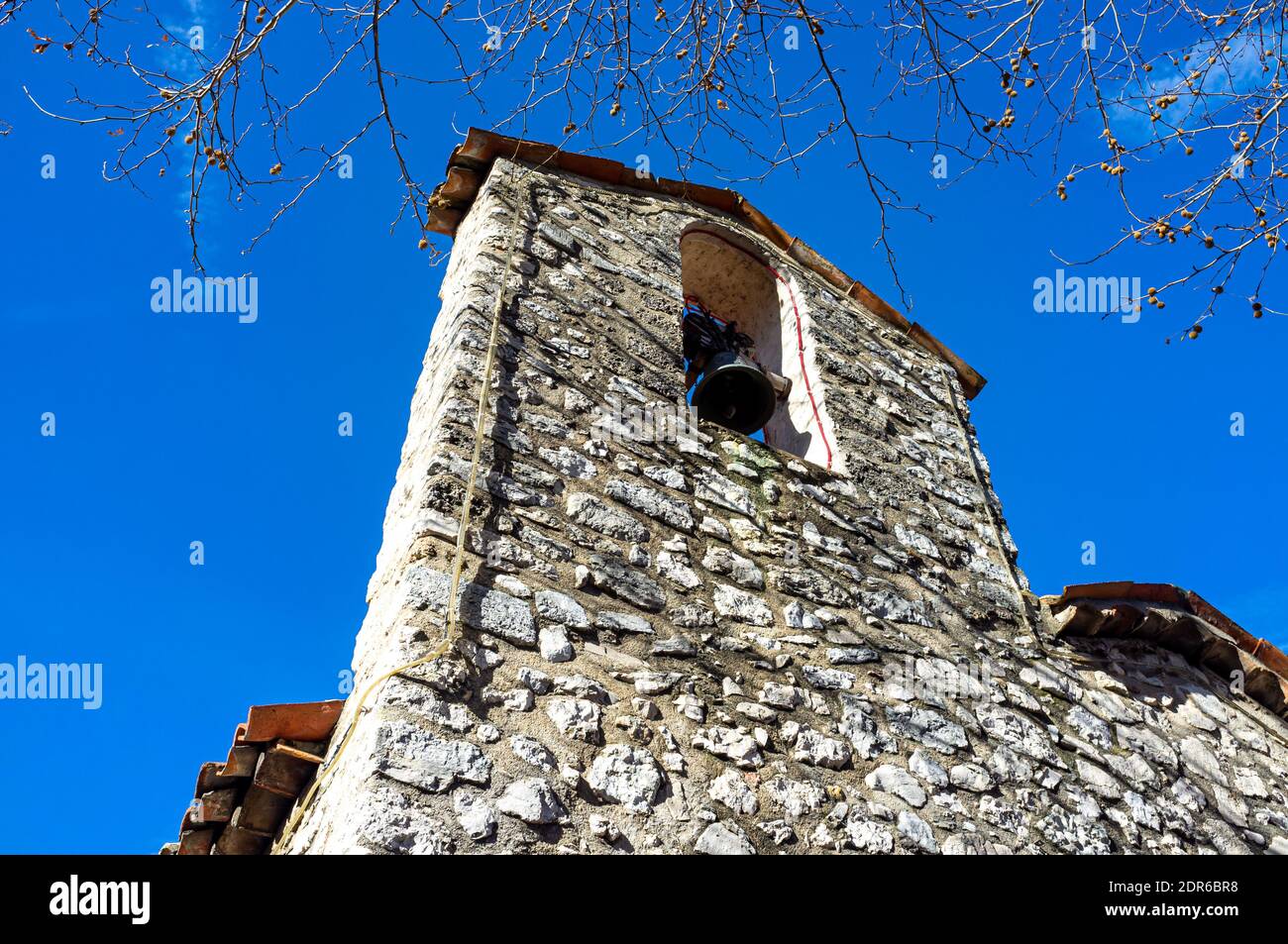 bell tower on medieval chapel in France Stock Photo - Alamy