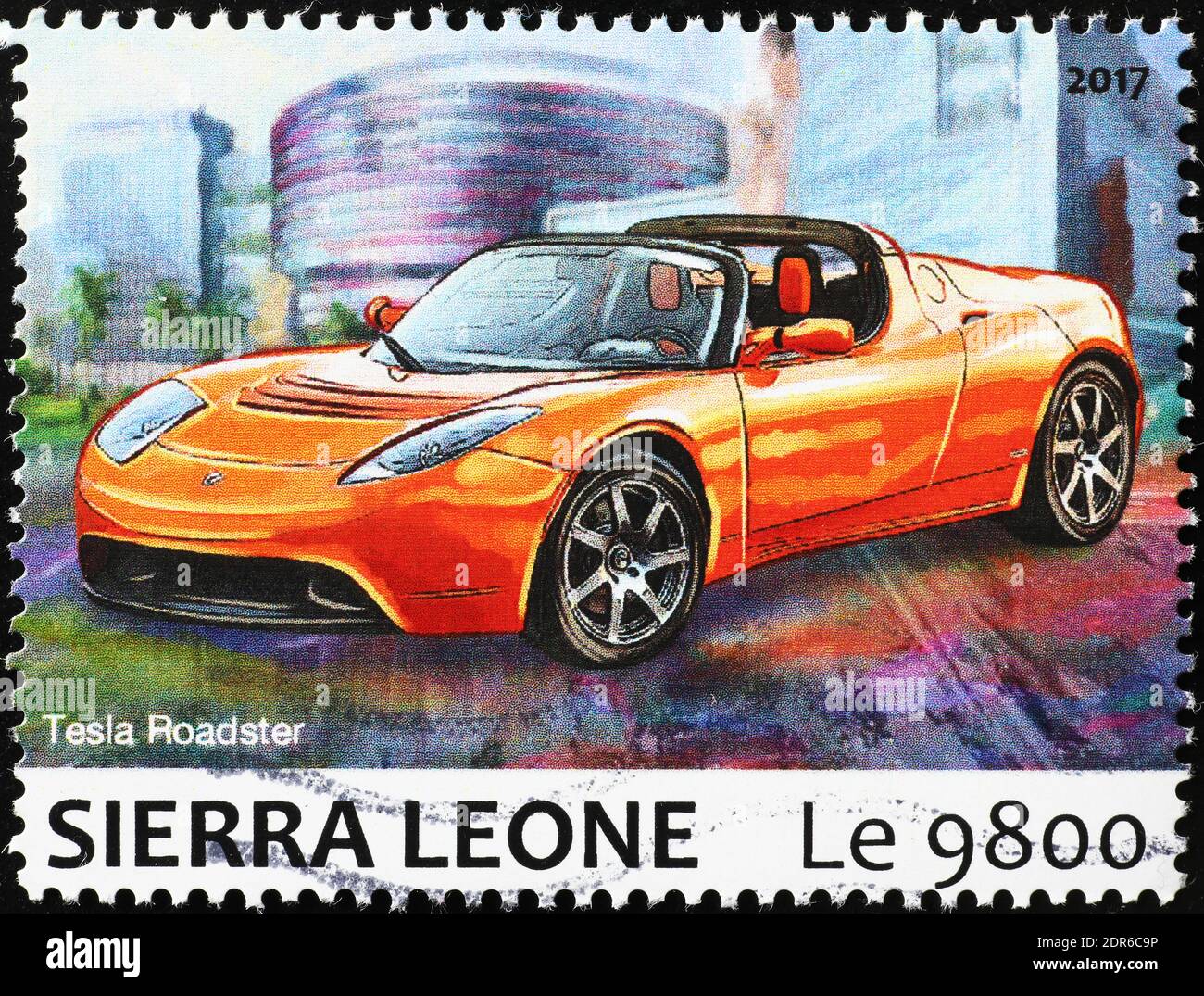 Tesla Roadster on postage stamp Stock Photo - Alamy