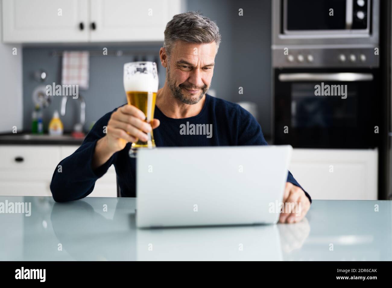 Virtual Beer Pub Party Event Using Laptop Stock Photo - Alamy