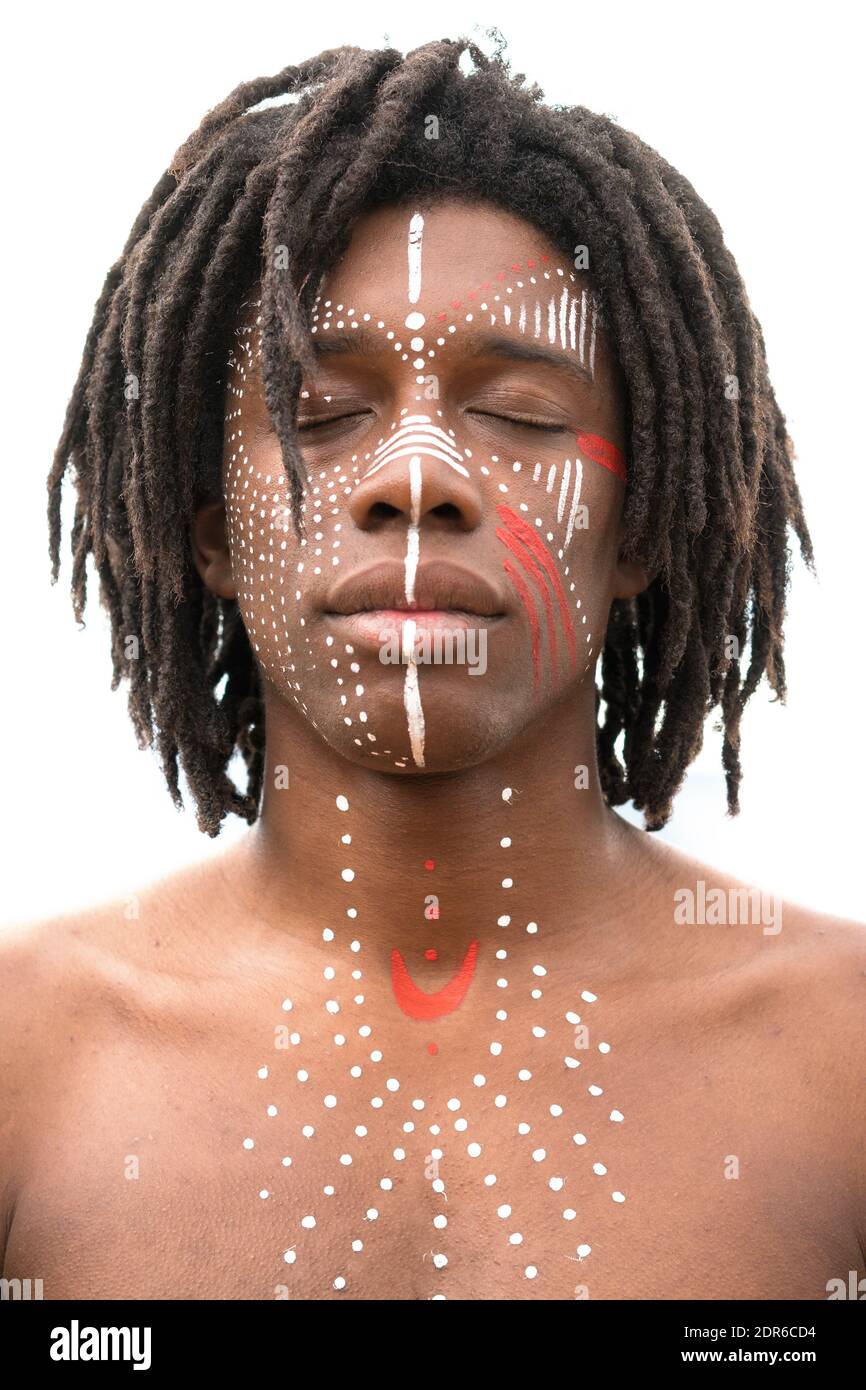 Tribal white face aboriginal face paint hi-res stock photography and ...