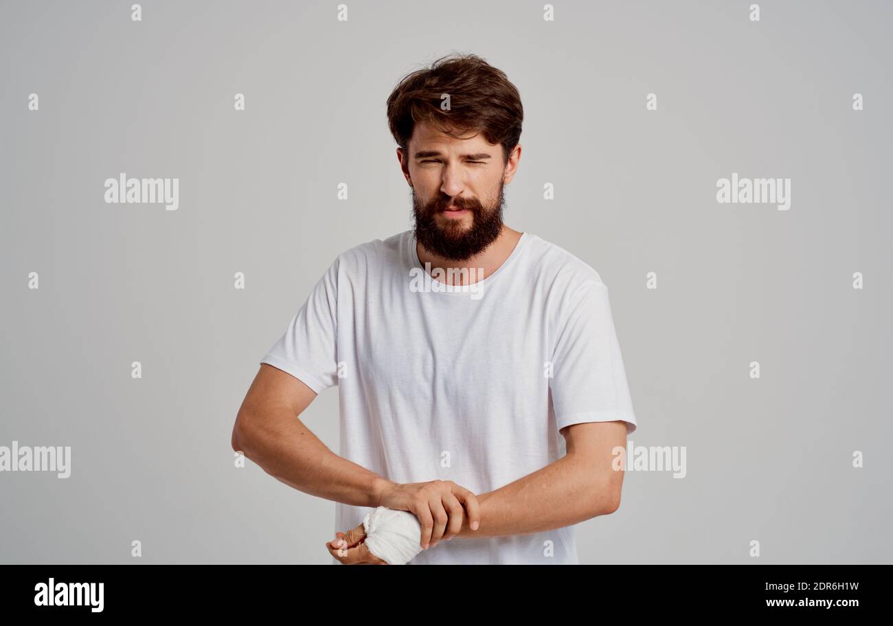 man with bandaged arm injury health problem hospital Stock Photo - Alamy