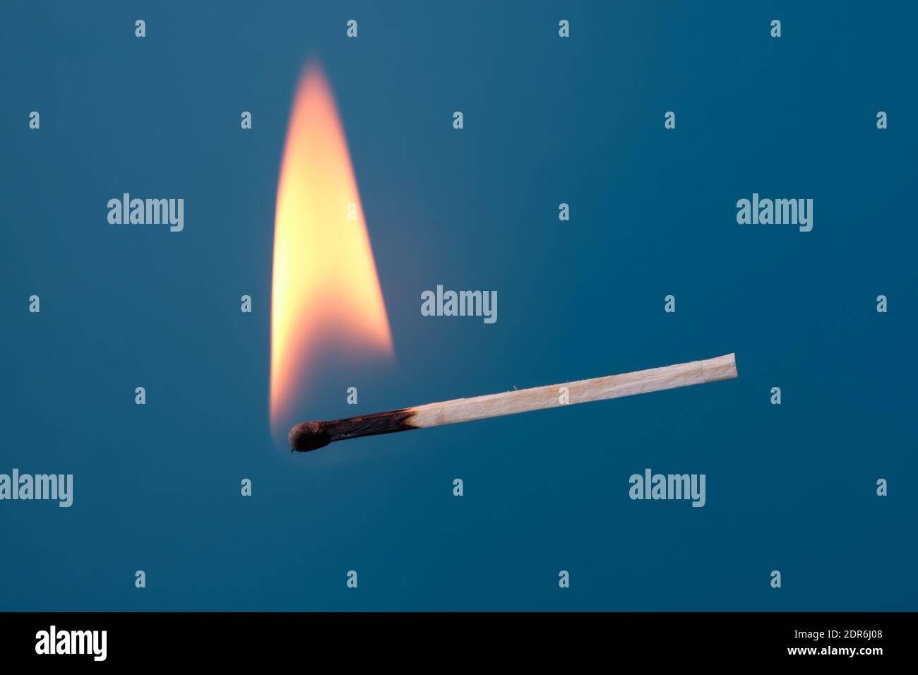 Burning Matchstick floating weightlessly Stock Photo - Alamy