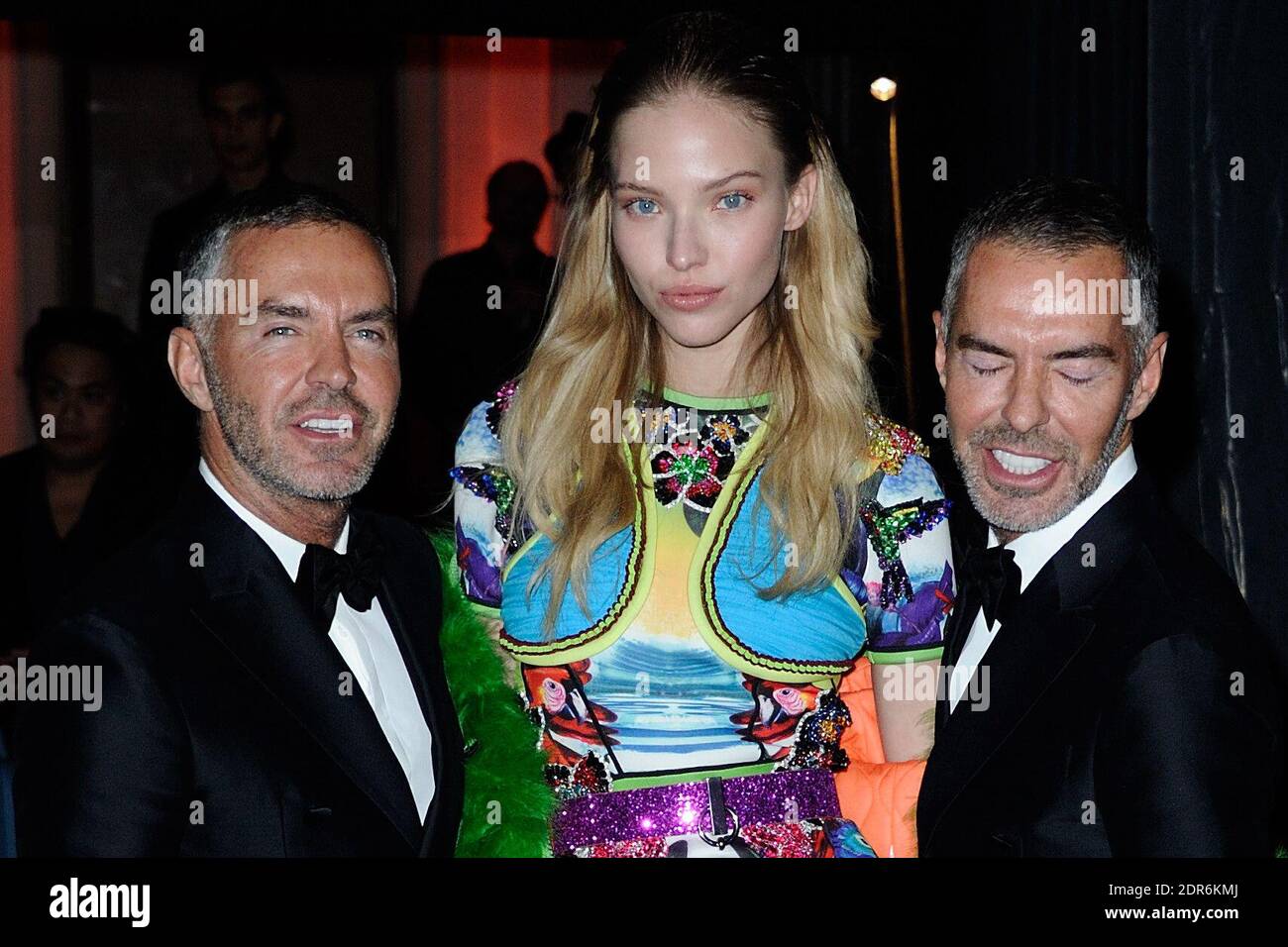 Dan Caten, Sasha Luss and Dean Cate attending the Vogue 95th ...