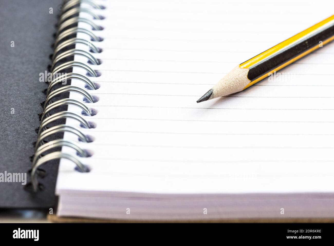 Note and Pencil Stock Photo - Alamy