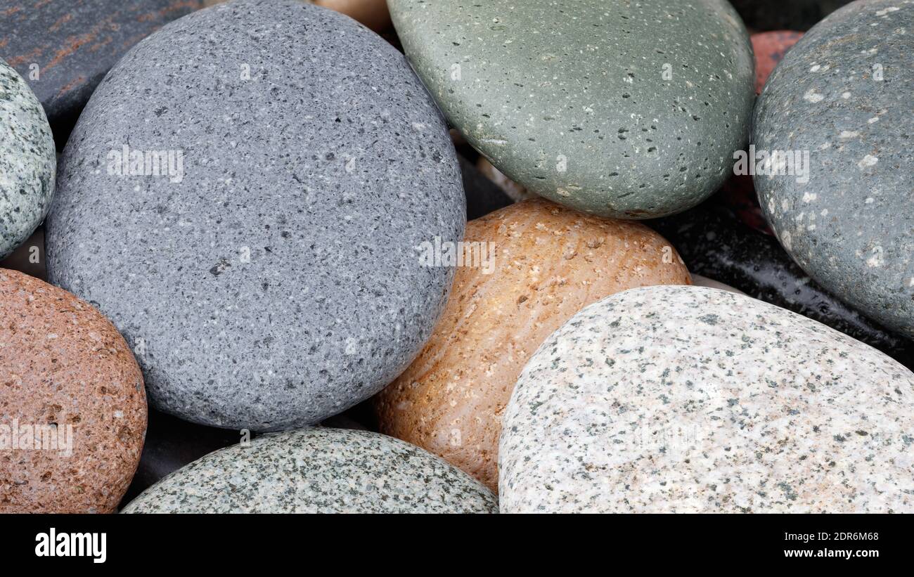 abstract background with round wet pebble stones Stock Photo - Alamy
