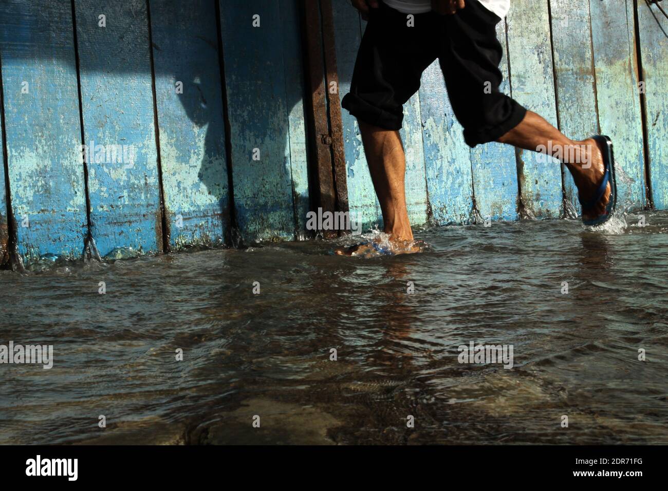 Human in flood hi-res stock photography and images - Alamy