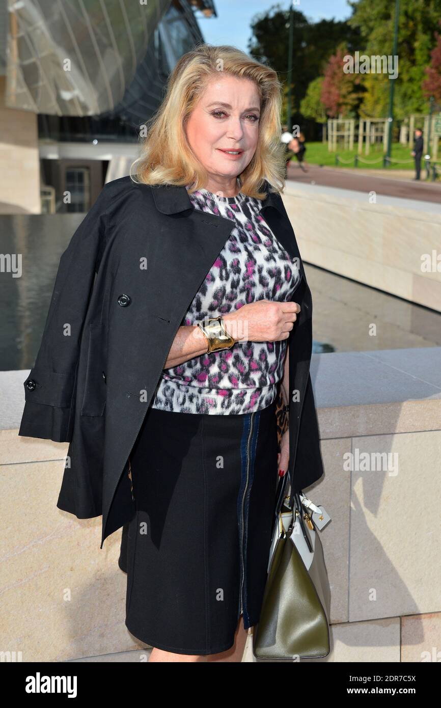 Catherine Deneuve attending Louis Vuitton's Spring Summer 2016 Ready-To ...