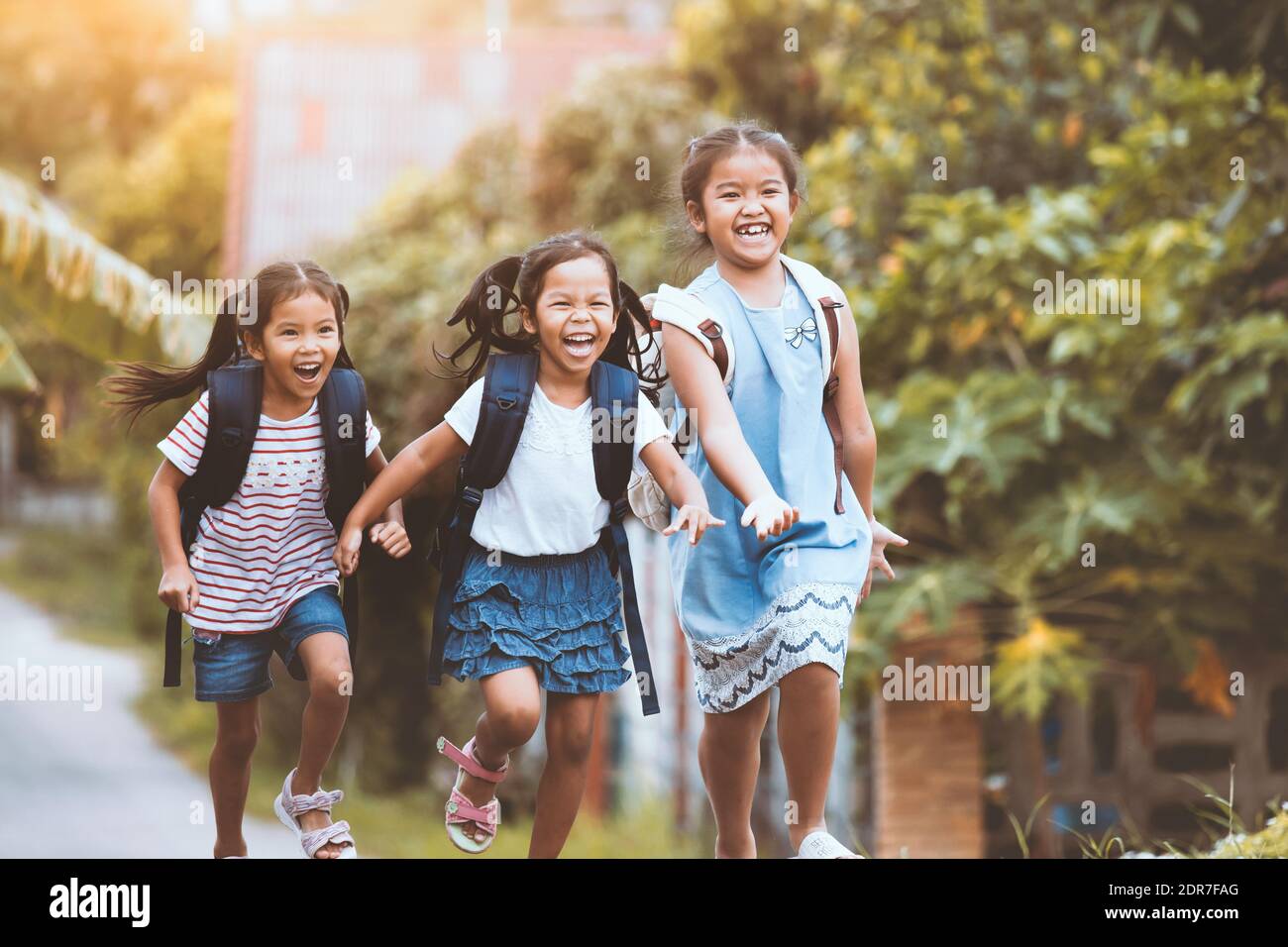 Student running road hi-res stock photography and images - Alamy