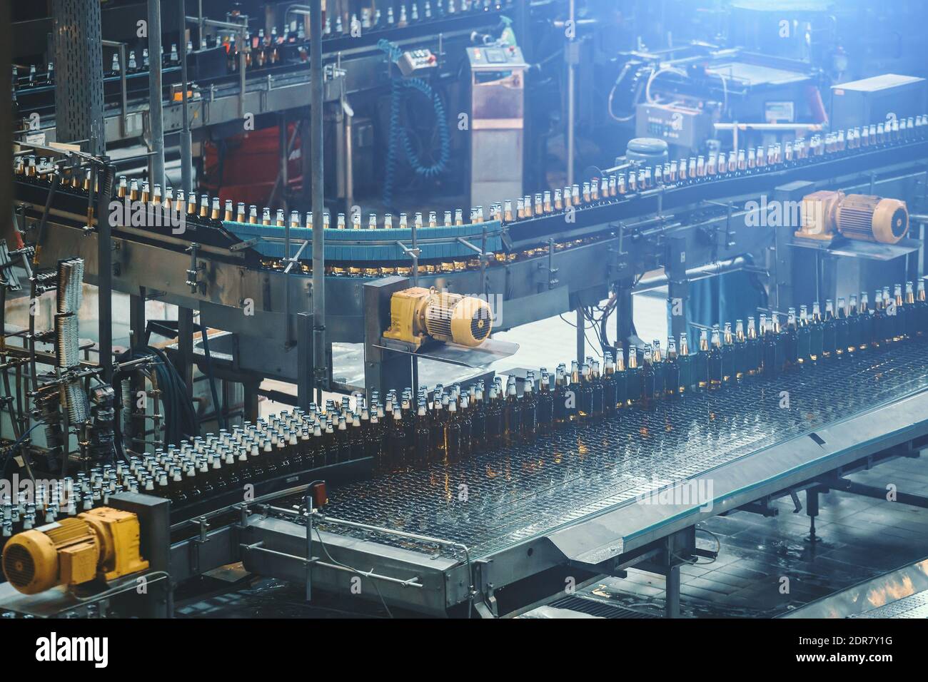 Conveyor belt, beer in bottles, brewery factory industrial production ...
