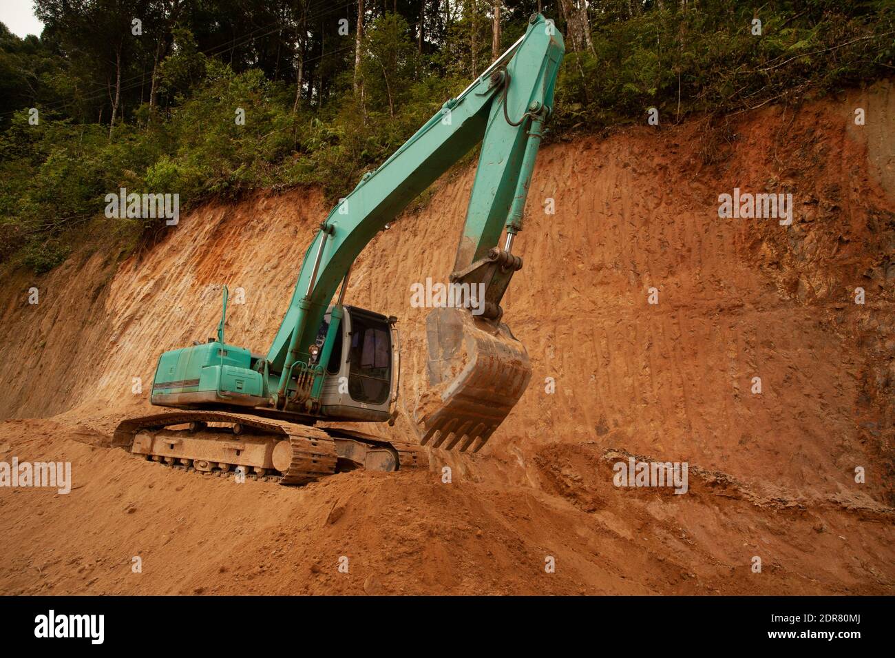 Excavator during excavation at construction site. Excavator working ...