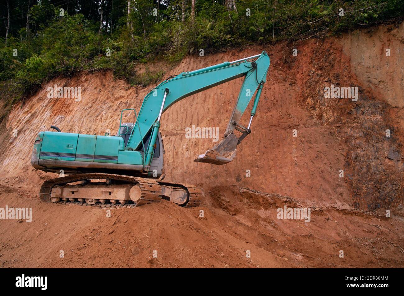 Excavator during excavation at construction site. Excavator working ...