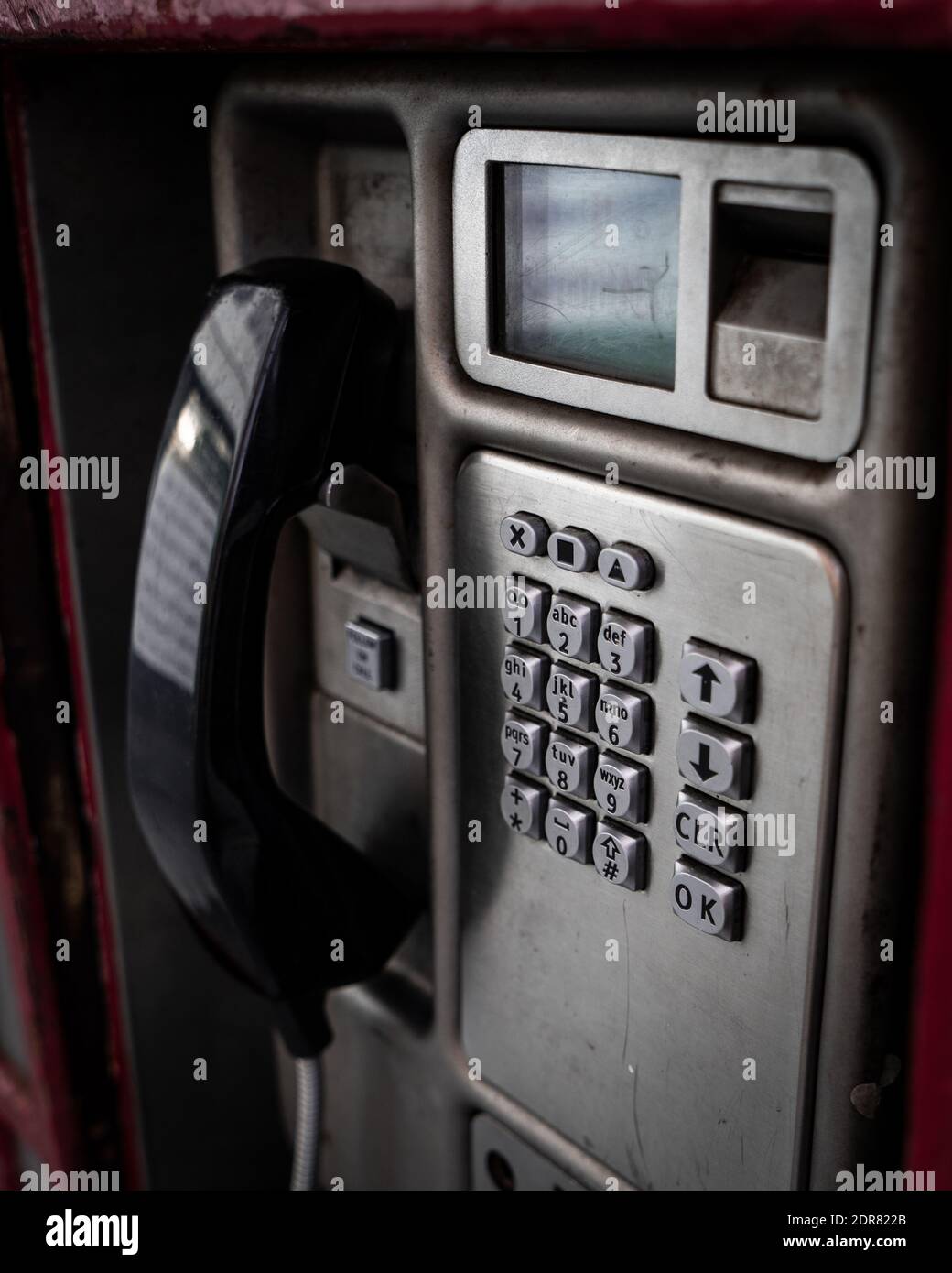 Metal payphone telephone numbered key pad buttons Stock Photo - Alamy