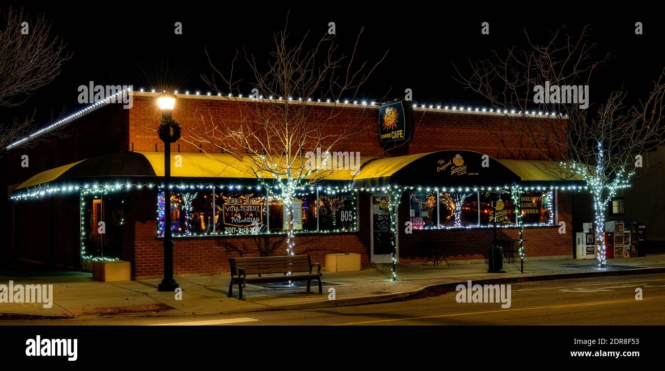 Classic city café at night with street lights and signs Stock Photo - Alamy