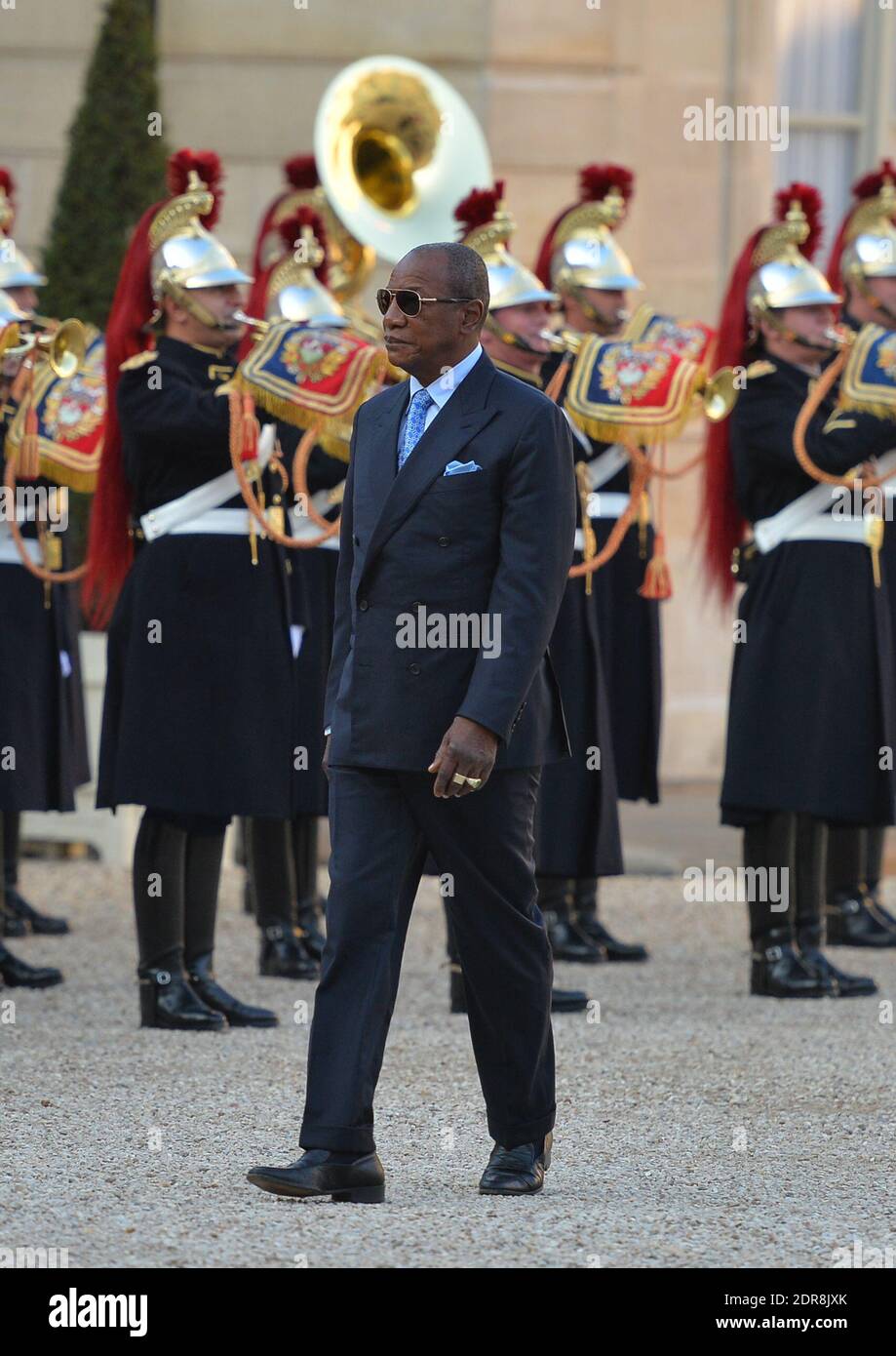 Guinea's President Alpha Conde arriving at the Elysee Palace in Paris ...