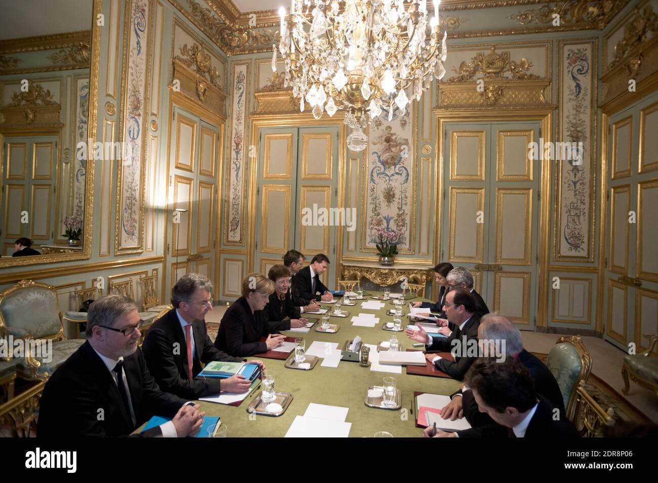 French President Francois Hollande receives German Chancellor Angela ...
