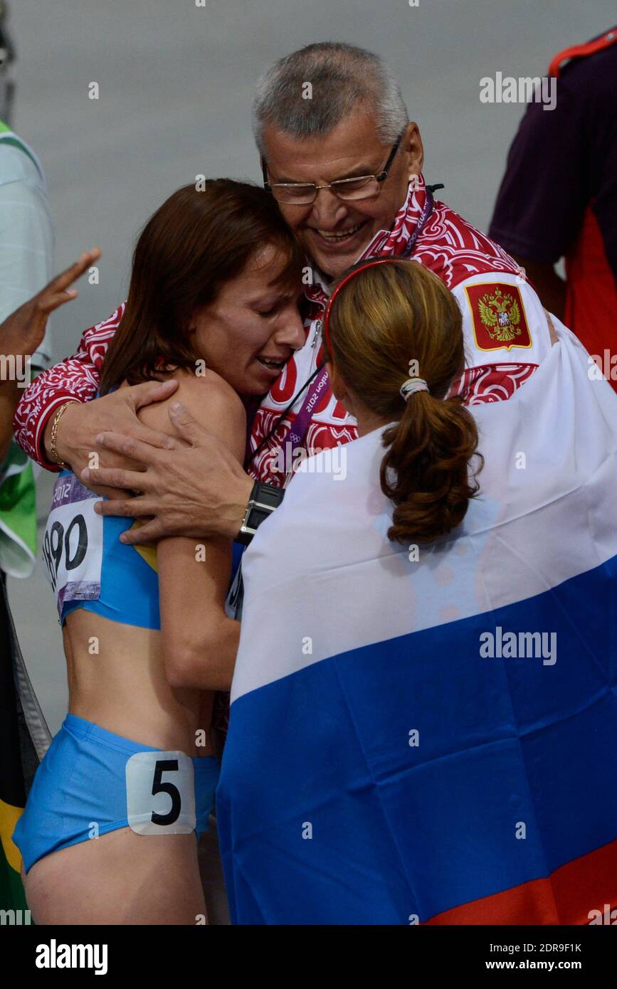 Files - Coach Wladimir Kazarin with Russia's Mariya Savinova after she ...