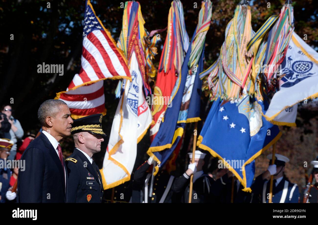 U.S. President Barack Obama lays a wreath at the Tomb of the Unknown ...