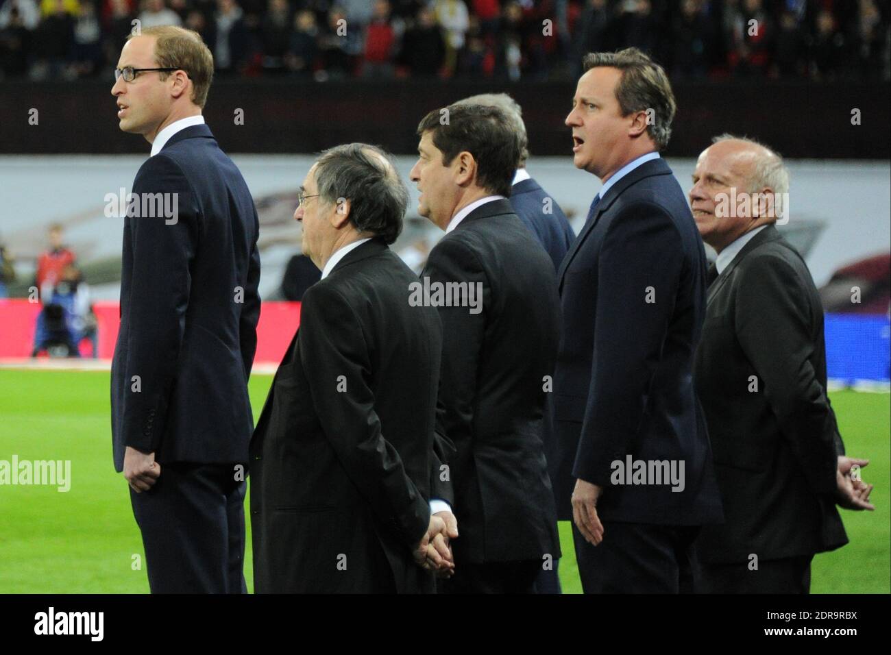 The Duke of Cambridge and Prime Minister David Cameron sing the ...