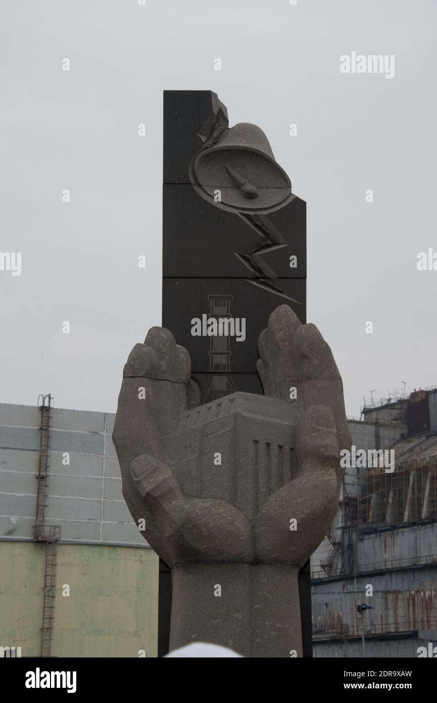 A shimmering monument stands next to the entrance to the site of the ...