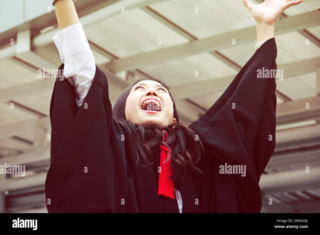 Beautiful young indian university arms hi-res stock photography and ...