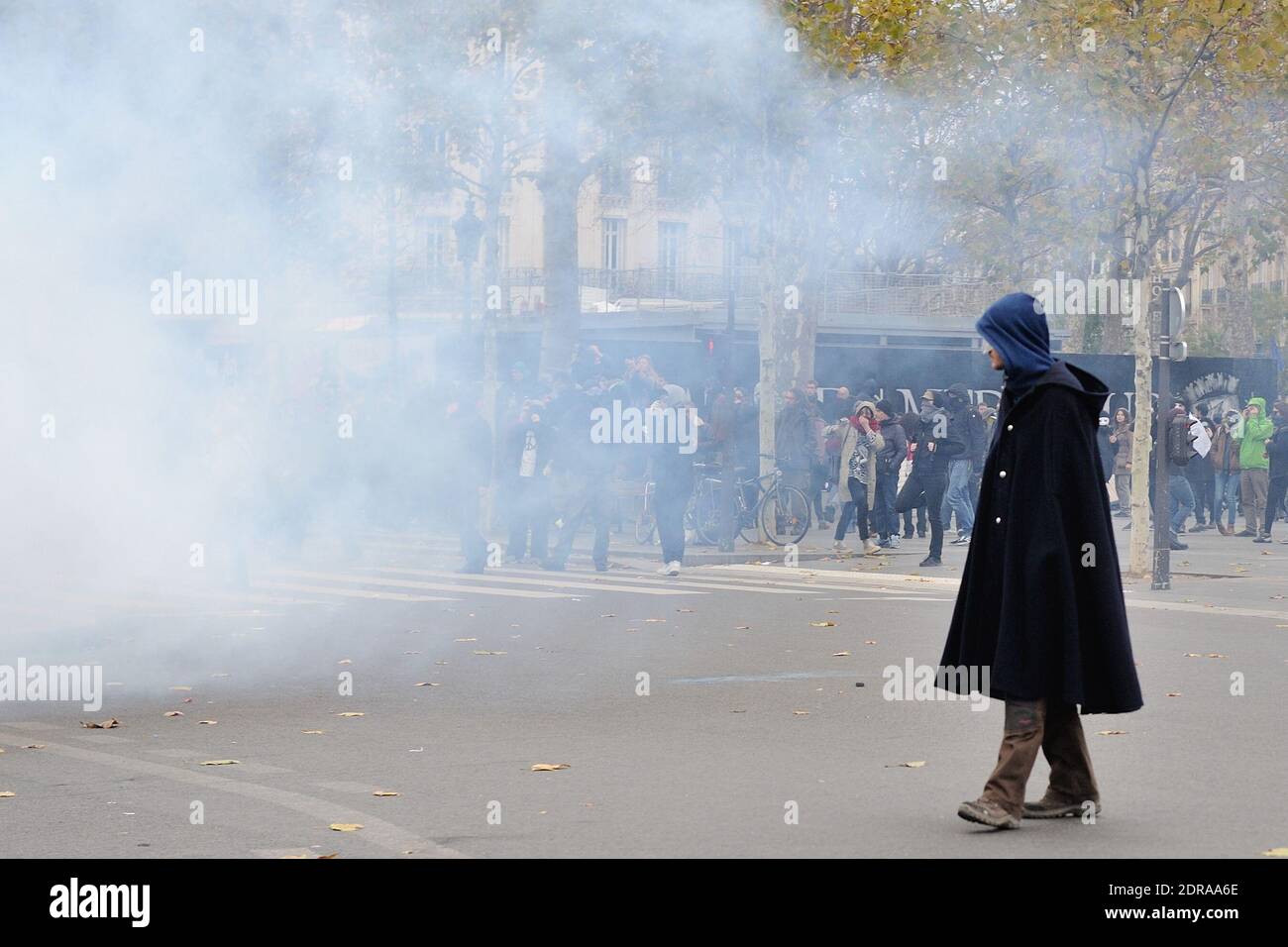 Climate protestors clash with riot police during a rally against global ...